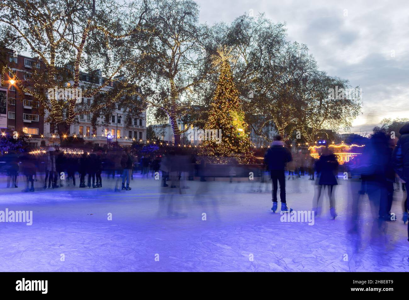 London, UK. 29th Nov, 2021. People seen skating around a Christmas Tree ...