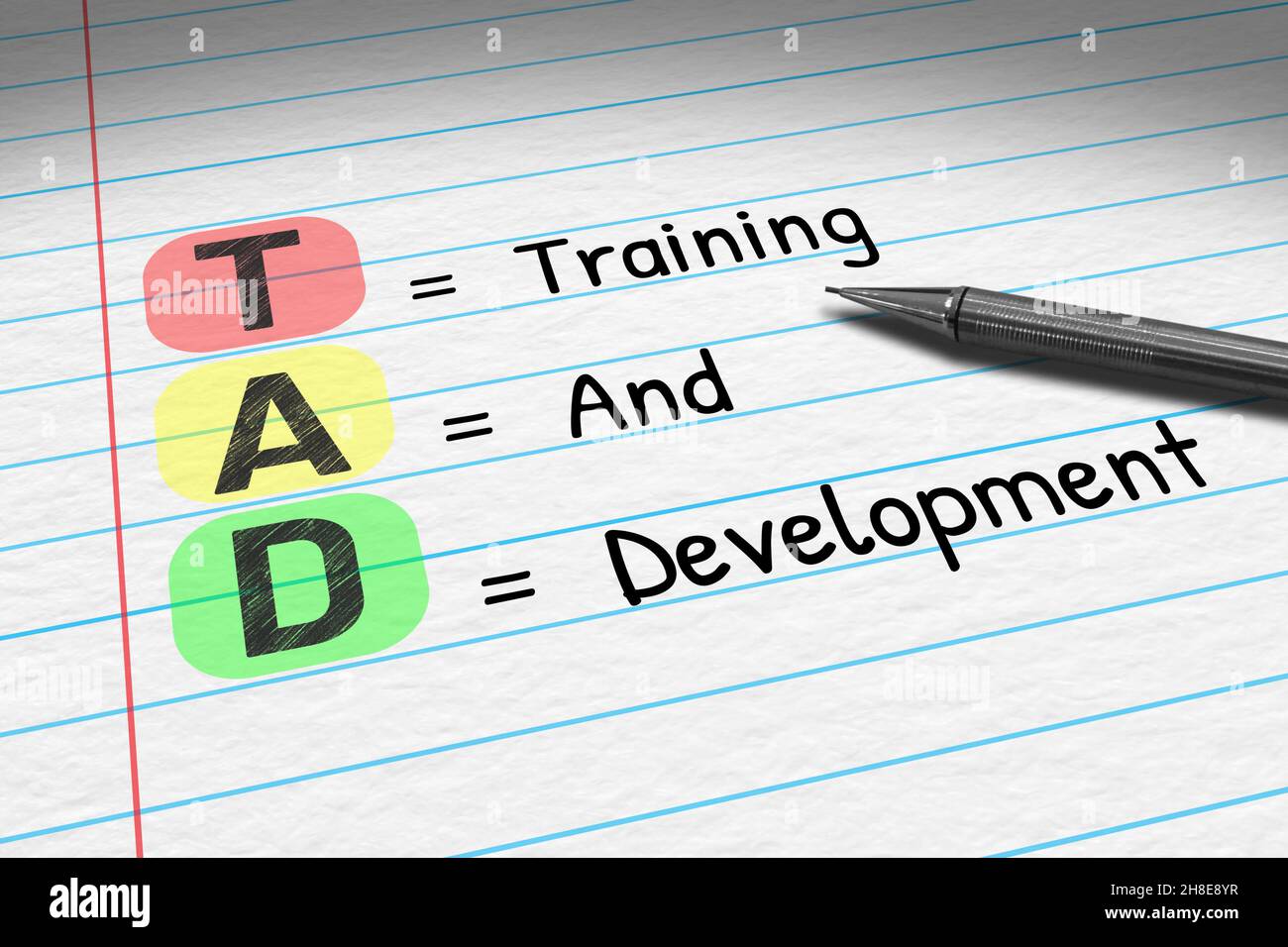 TAD - Training and Development. Business acronym on note pad Stock ...