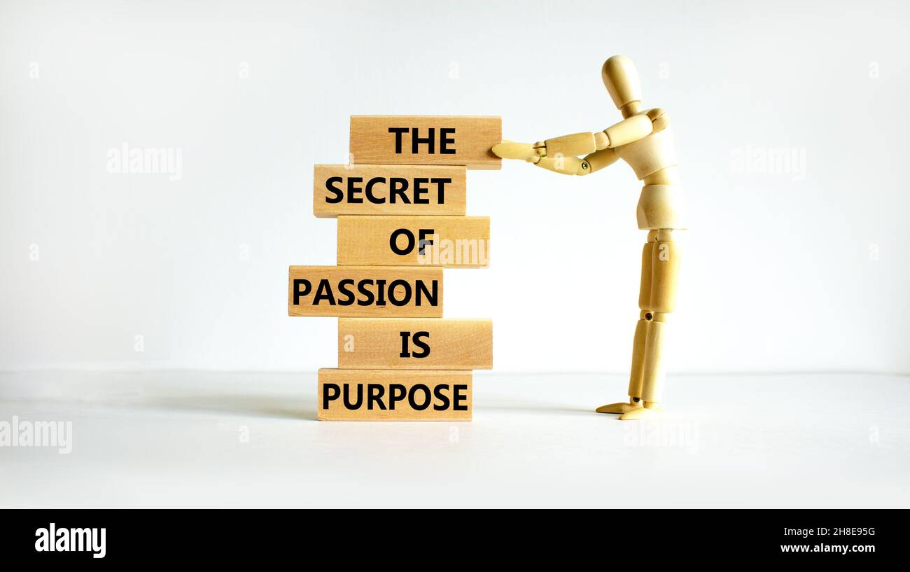 Passion and purpose symbol. Wooden blocks with concept words The secret ...