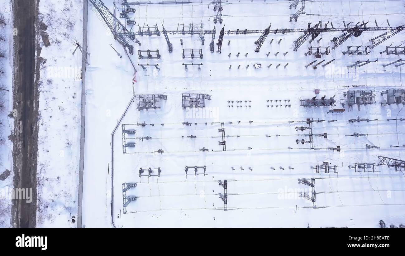 Rows of electric poles of substation. Action. Top view of small ...