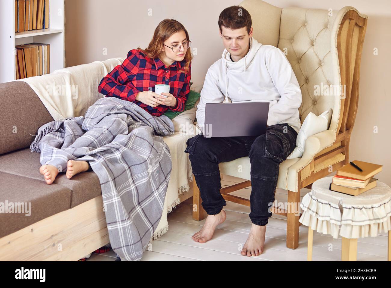 Setting up laptop to work from home, an IT specialist sets up remote ...