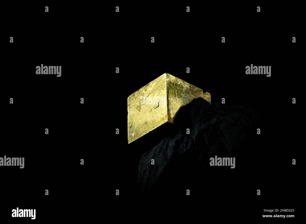 Pyrite cube shape with matrix collection specimen on black background ...