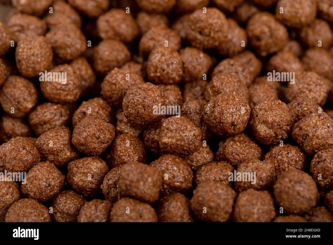 Brown corn flakes background and texture Stock Photo - Alamy