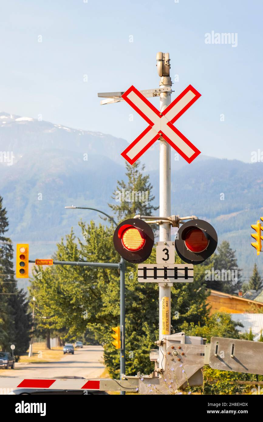 flashing red warning lights on American railroad crossing Stock Photo ...