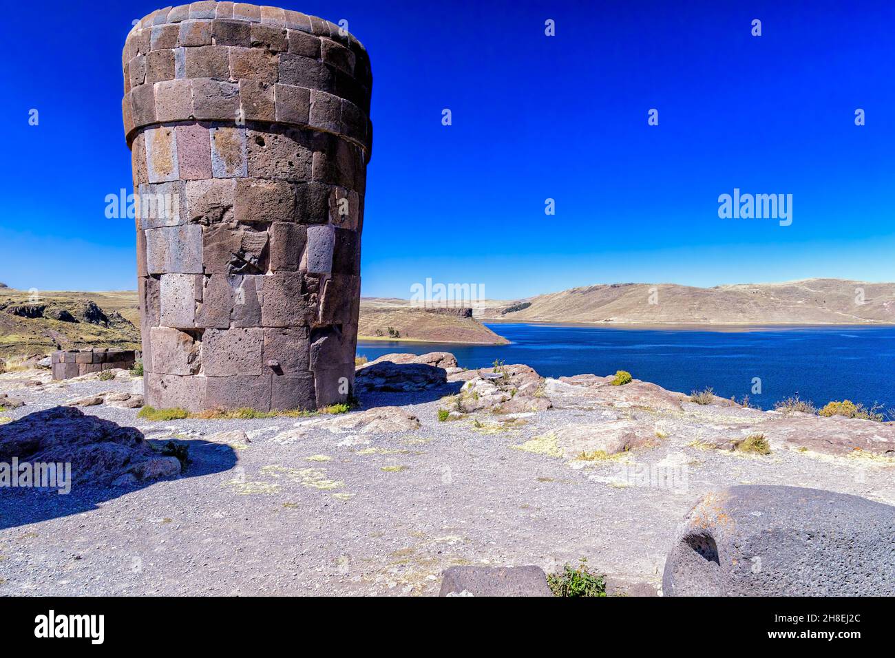 One of several chullpas located on a hill overlooking Lake Umayo at the ...