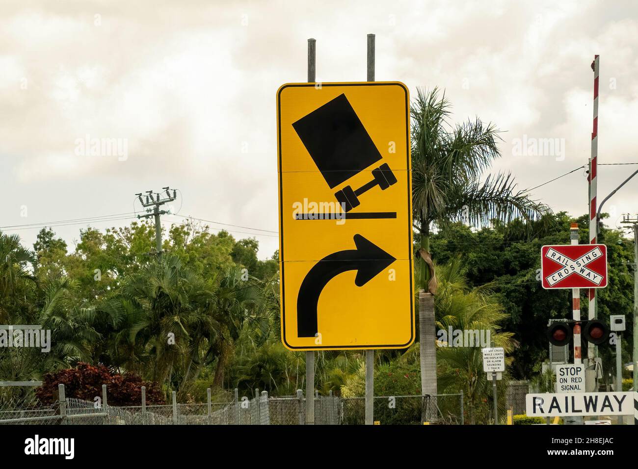 Sharp turn road sign warning to lorry drivers Stock Photo - Alamy