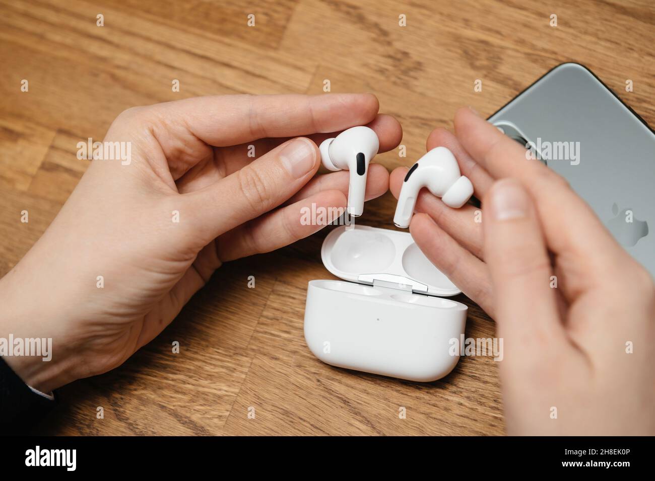 Woman holding after unboxing new AirPods Pro wireless Bluetooth in-ear ...