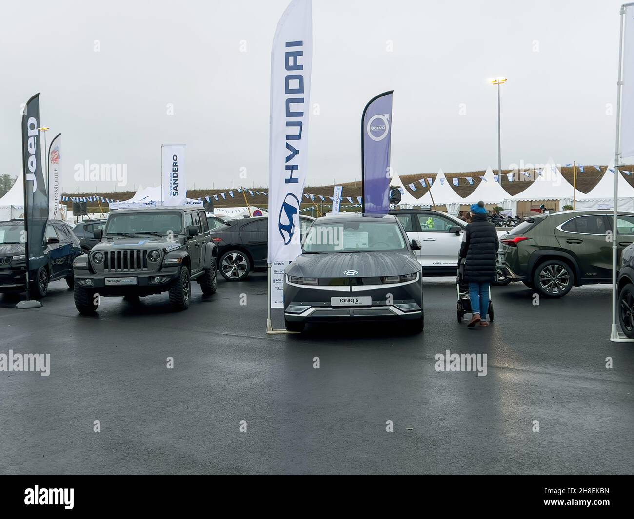 Multiple electric cars presentation Hyundai Ioniq 5, Mini, Jaguar Stock ...