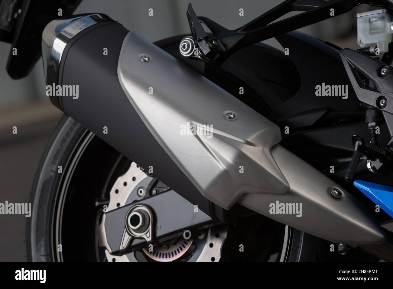 Closeup of the details of a modern motorcycle wheel outdoors in the ...