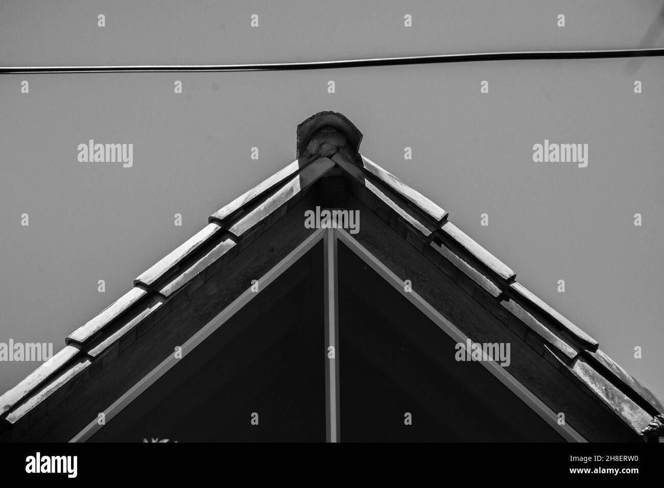 Exterior view of a roof of a house with a geometric triangular shape ...