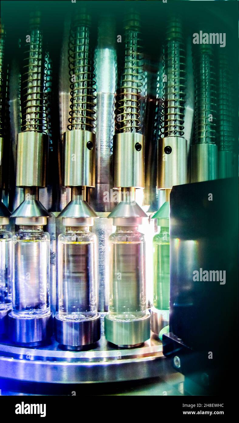 Vaccine Pharmaceutical Drug Vials on Filling Machine Stock Photo - Alamy