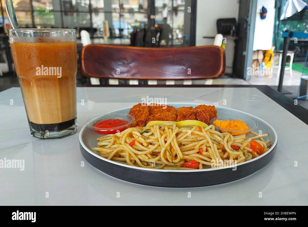 Spaghetti at Malacca Toast Cafe, Jakarta, Indonesia Stock Photo - Alamy