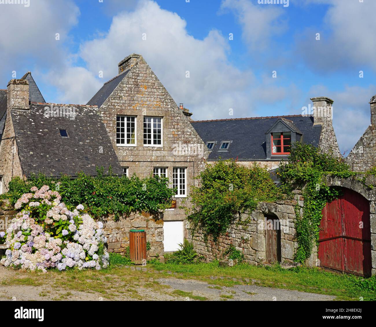 LOCRONAN, FRANCE -13 AUG 2021- View of Locronan, a historic stone ...