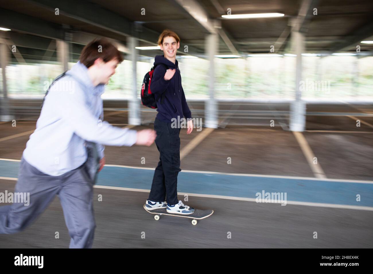 Two boys skateboarding hi-res stock photography and images - Alamy