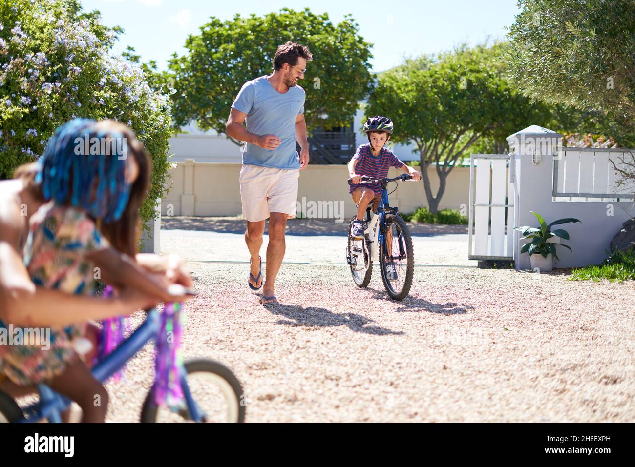 Girl riding bike shorts hi-res stock photography and images - Alamy