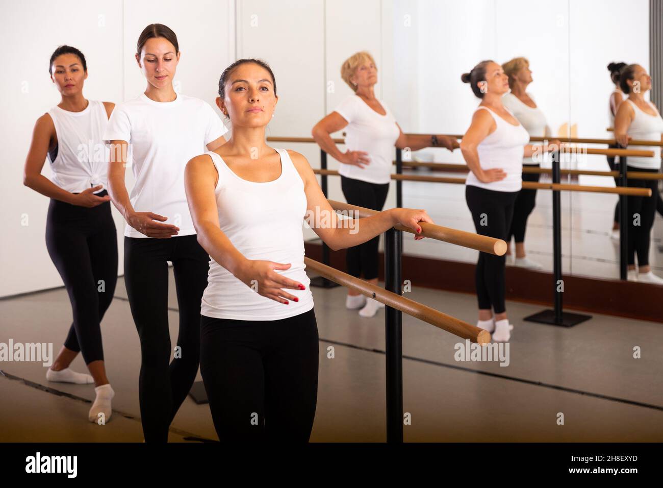 Group of women doing ballet dance moves Stock Photo - Alamy