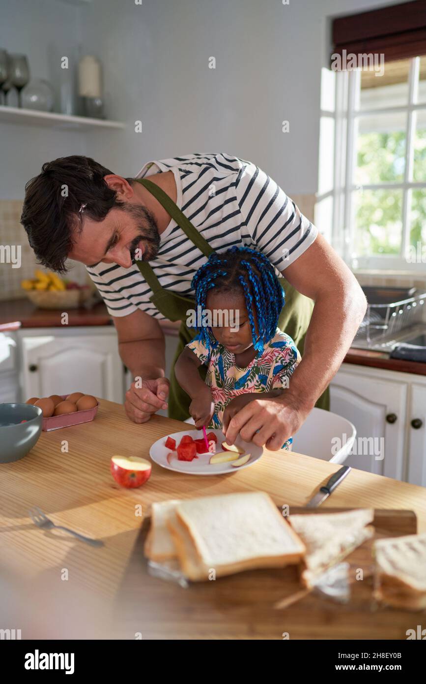 Father helping daughter hi-res stock photography and images - Alamy