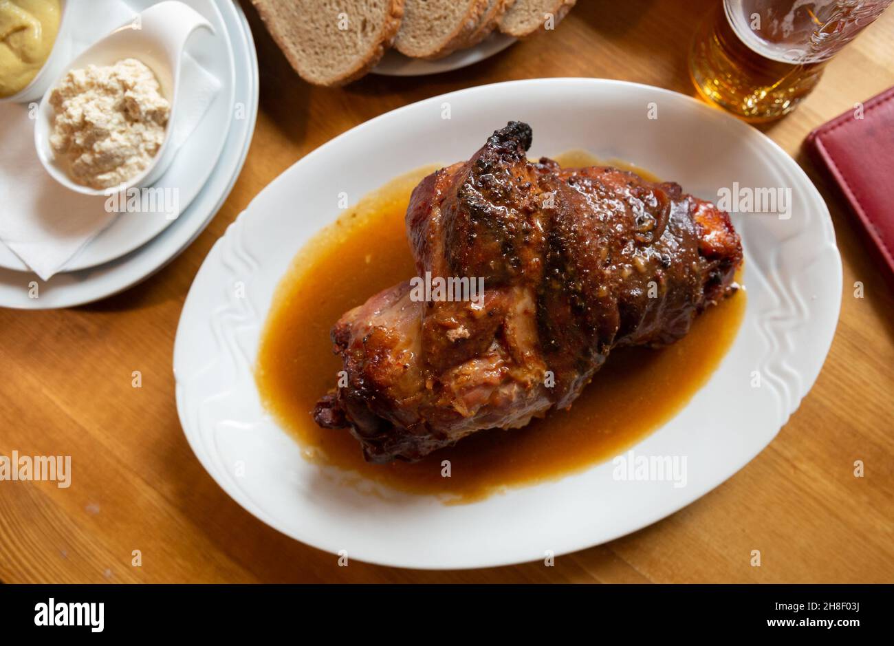 Delicious grilled knuckle of pork with horseradish and mustard Stock ...