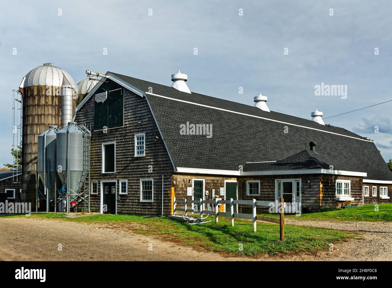Picturesque wood shingle barn in a goldern hour at Appleton Farms ...