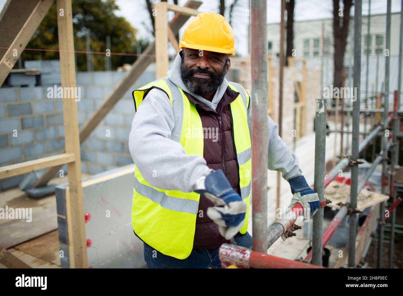 Portrait confident male construction worker at construction site Stock ...
