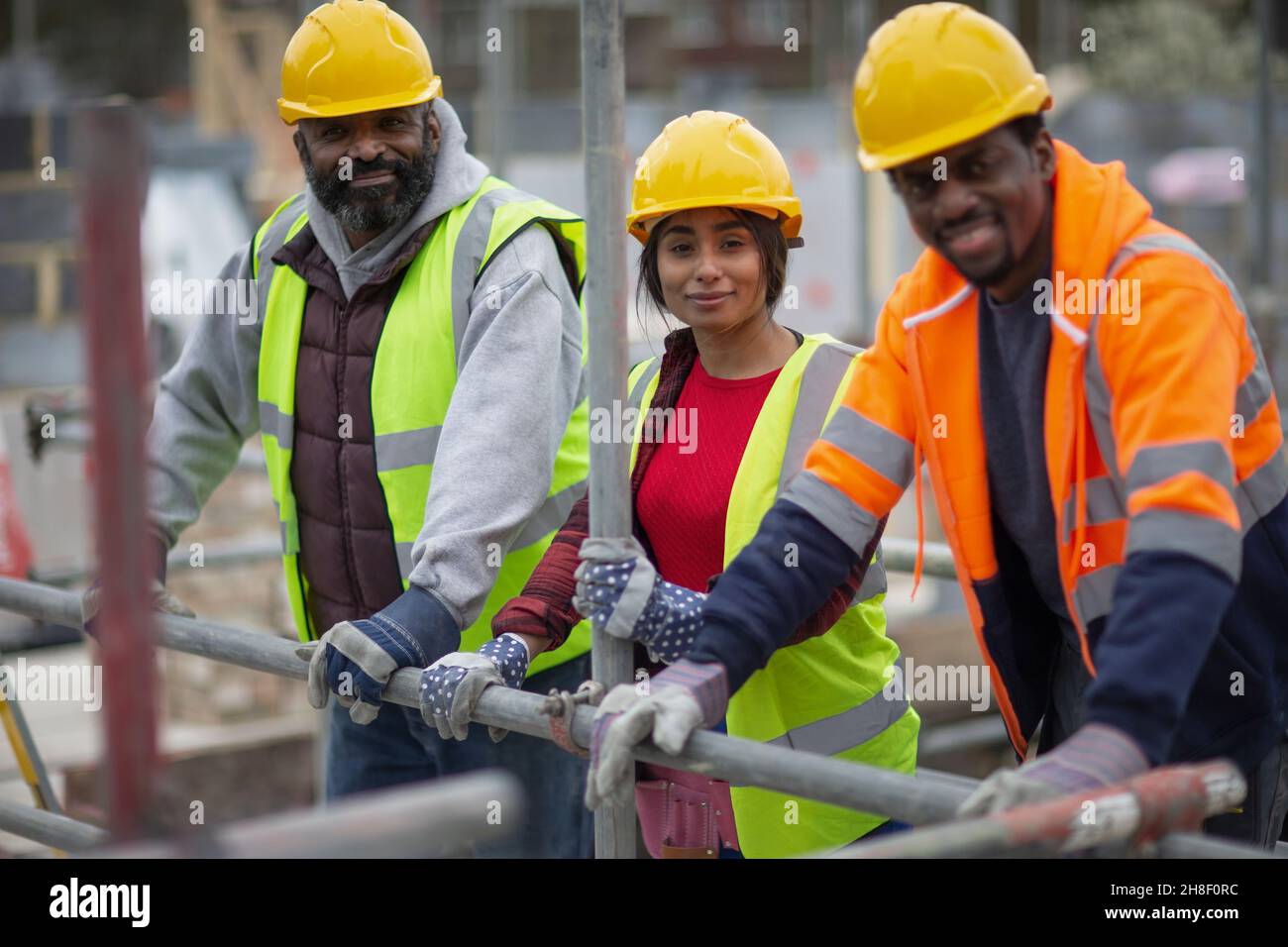 Portrait confident construction workers at construction site Stock ...