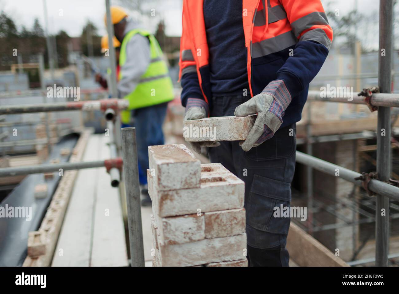 Woman Laying Bricks High Resolution Stock Photography and Images - Alamy