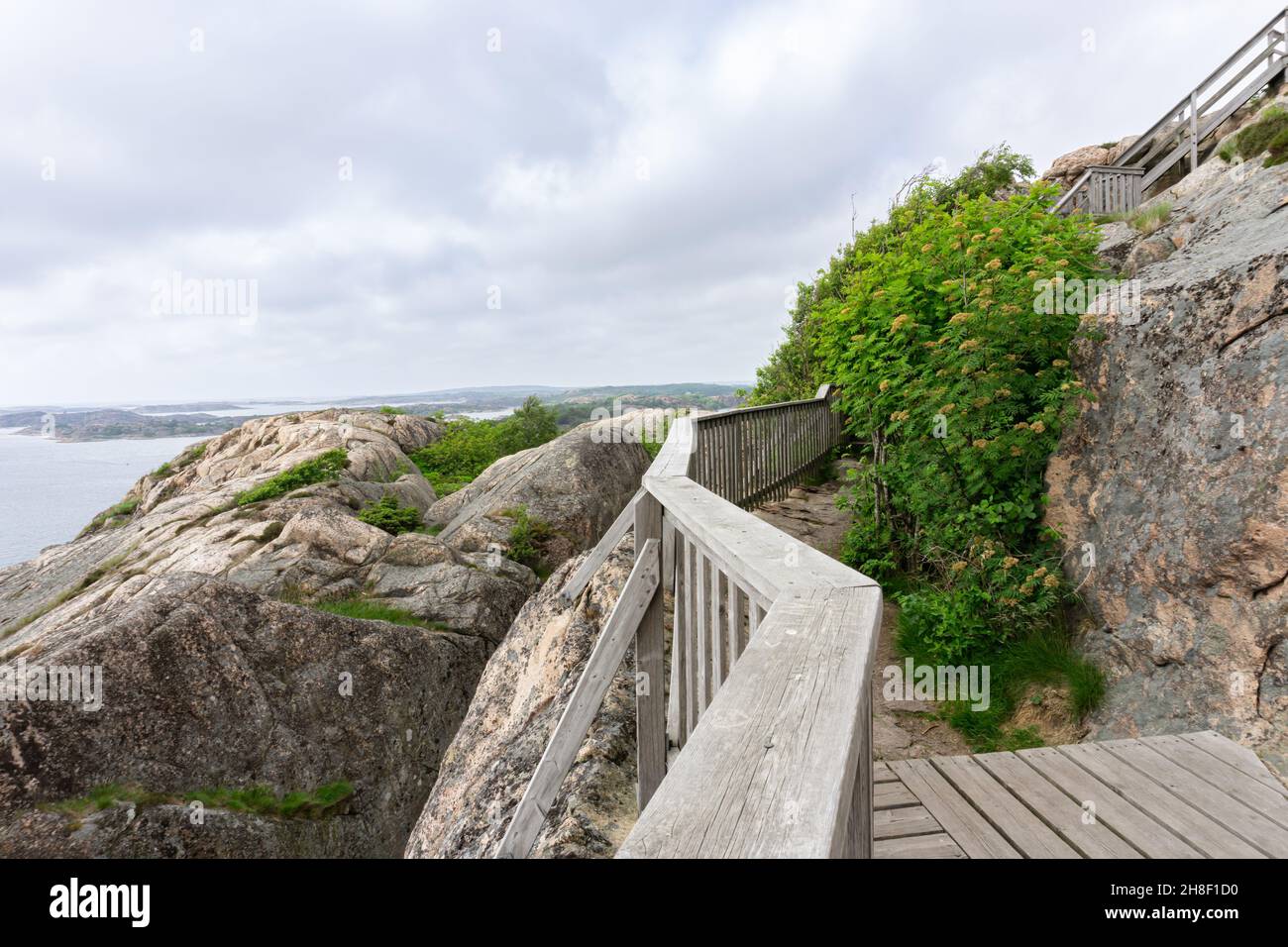 Fjällbacka, Sweden - June 9, 2021: Wooden path leading uphill to one of ...