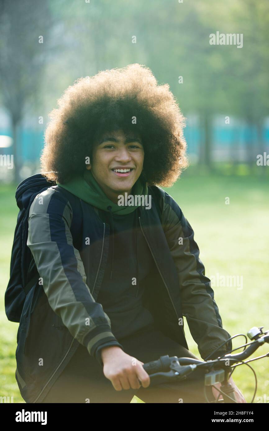 Man on black afro hi-res stock photography and images - Alamy