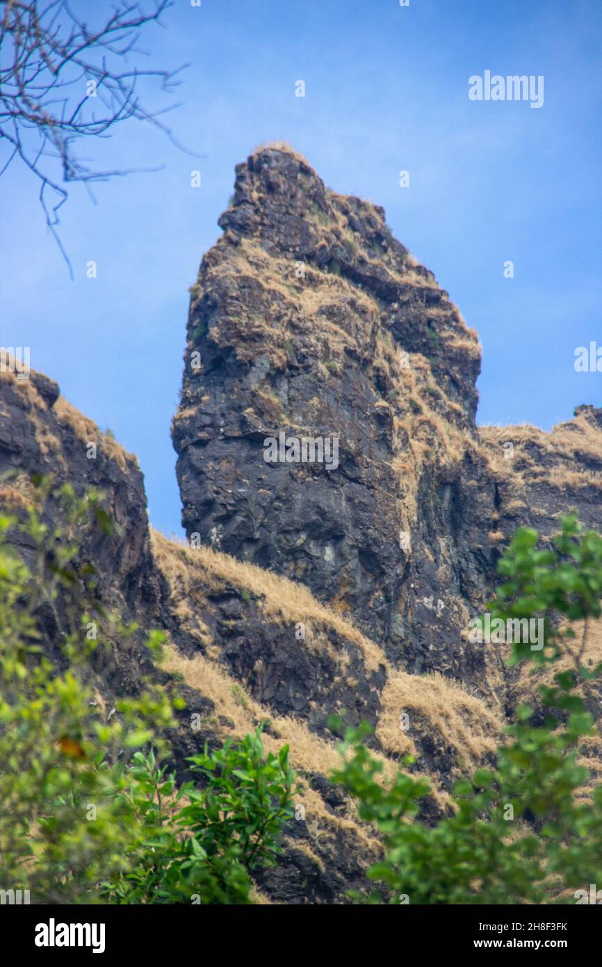 Vertical shot of the rocks in the Irshalgad Fort. Panvel city, Mumbai ...