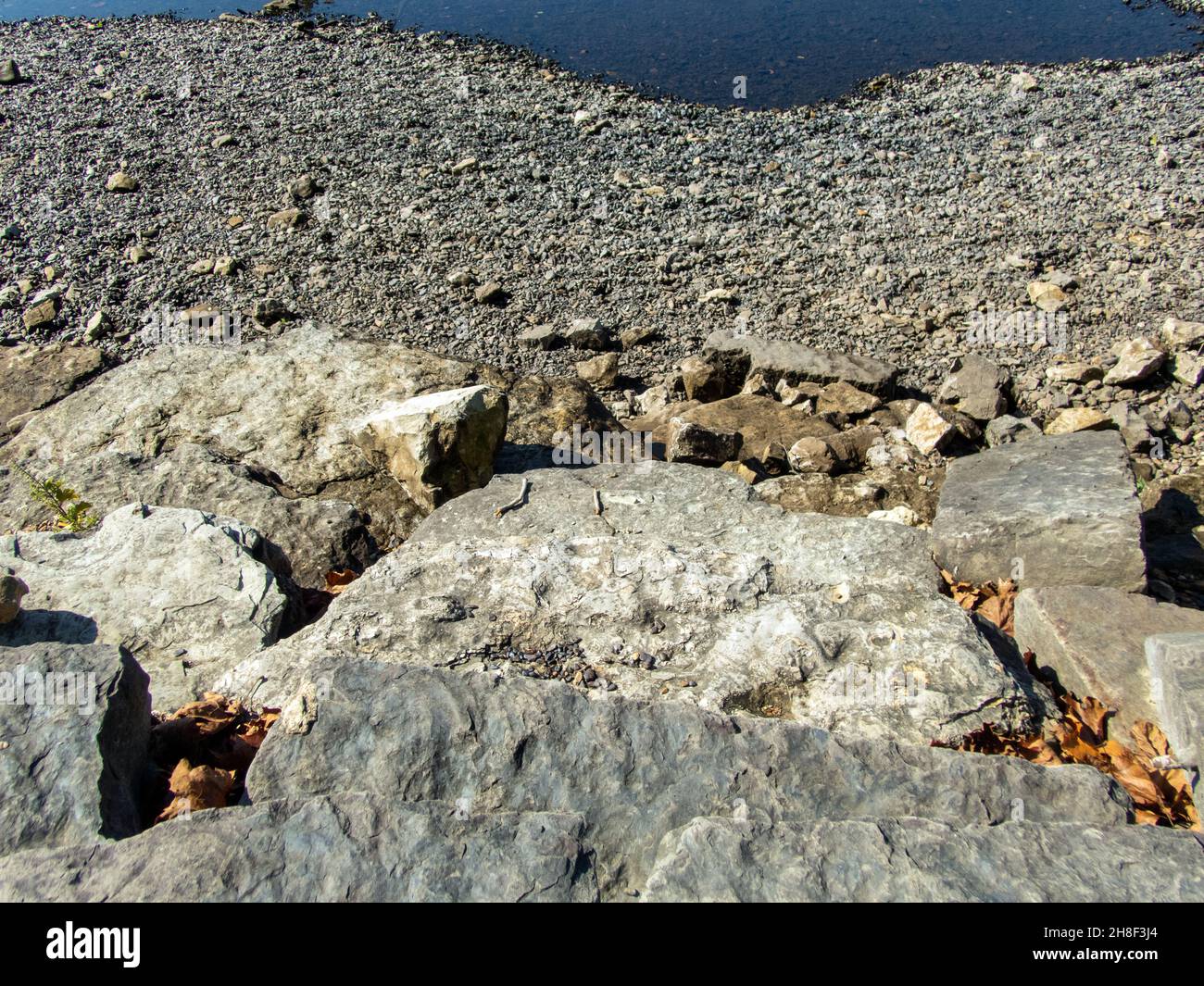 Unique angle of large boulders, medium size rocks, and gravel leading ...