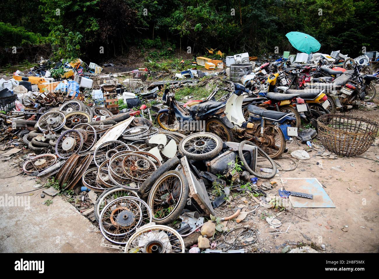 waste scrap with engine motorcycle old rust ,heap of old rusty metal ...