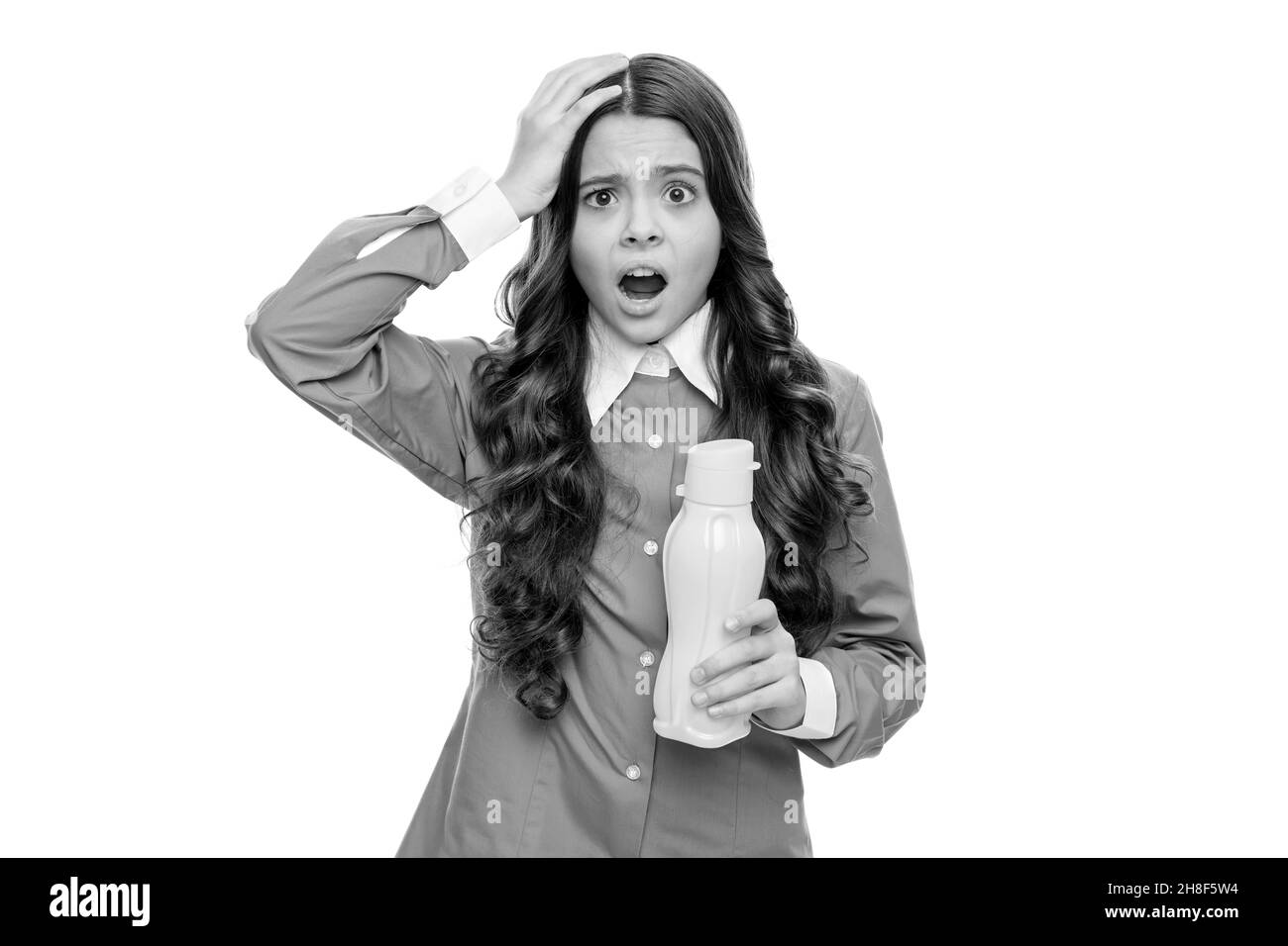 Dried out from thirst. Desperate child hold yellow plastic bottle ...