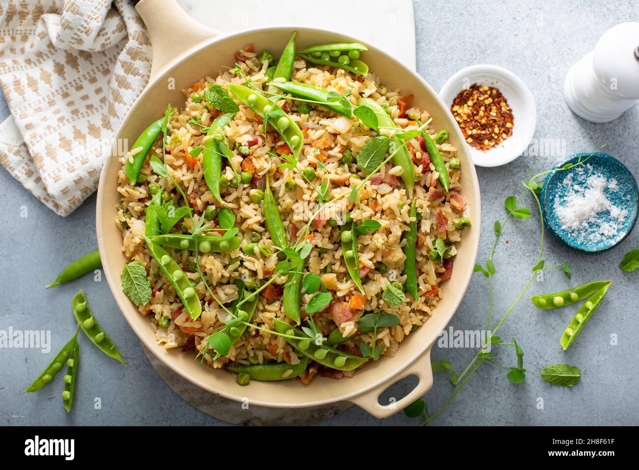 Breakfast fried rice with green peas and carrots Stock Photo - Alamy