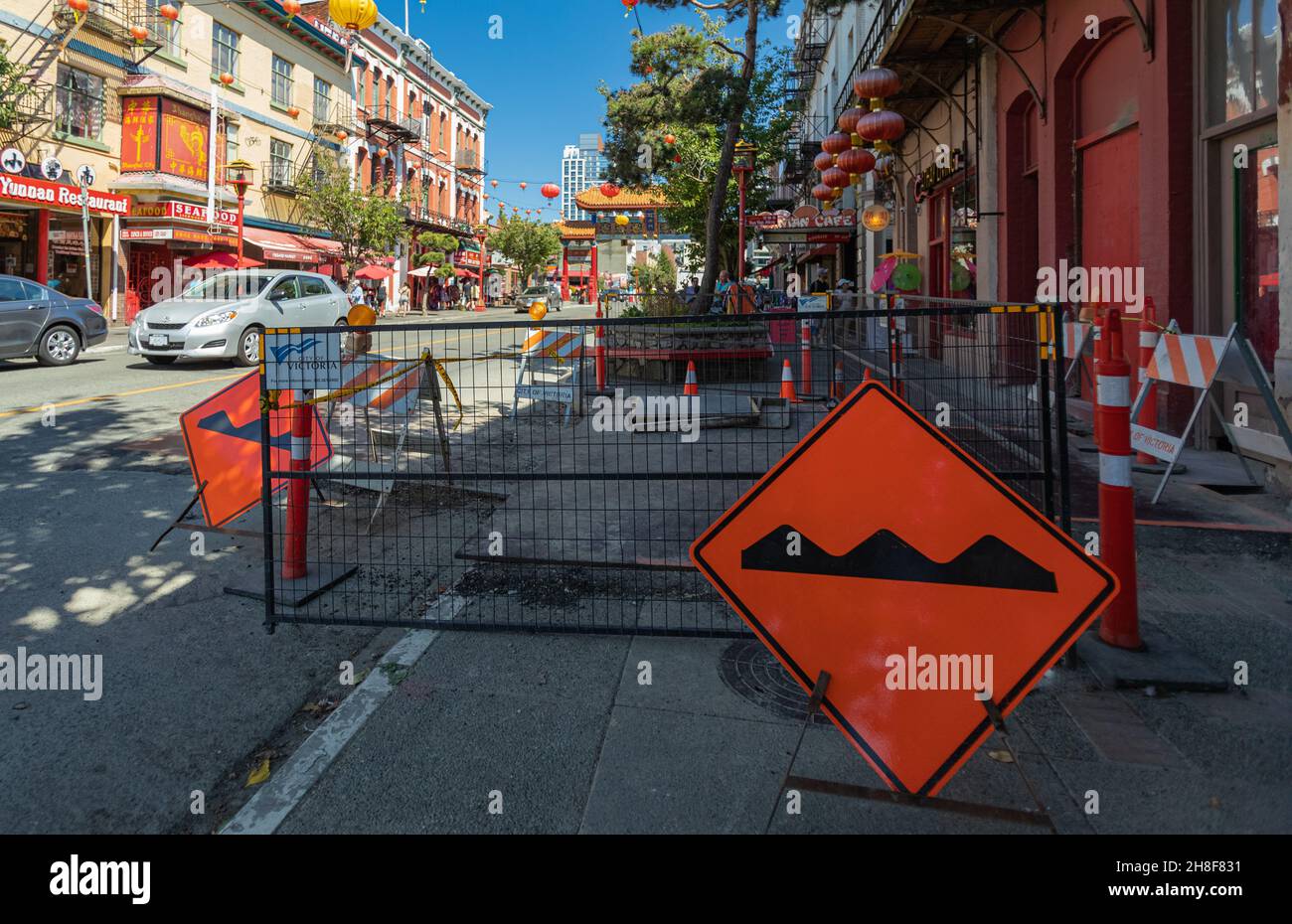 Road work on a street of a city. Street view of road construction site ...