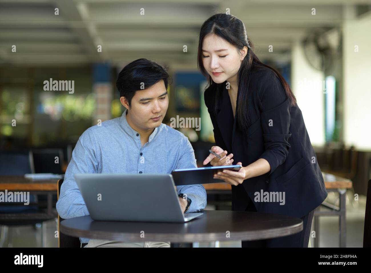 Businesspeople working together. Businesswoman manager briefing an ...