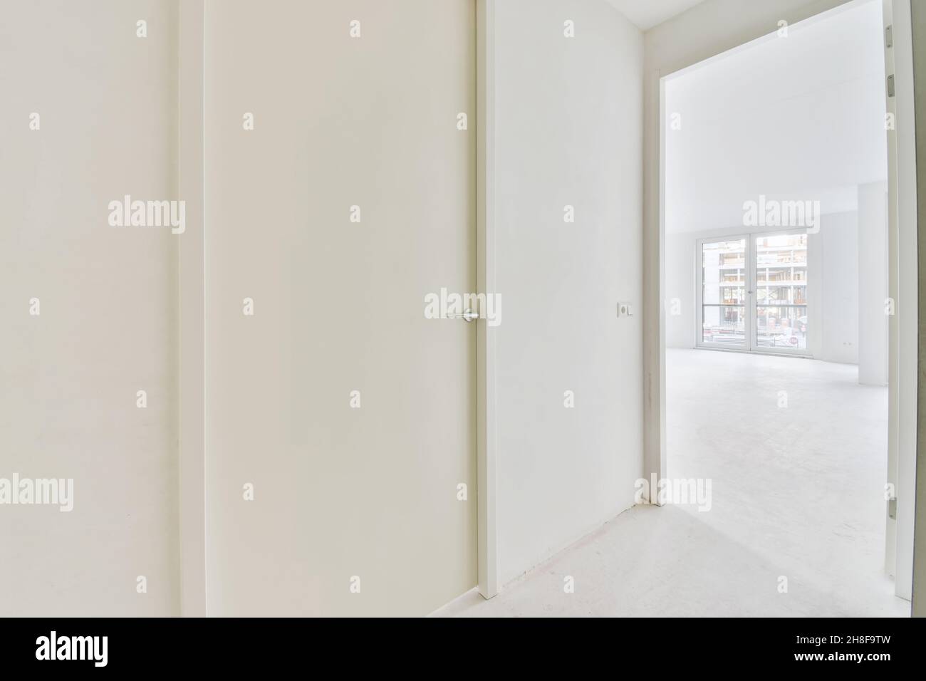 A completely white hallway in an elegant apartment Stock Photo - Alamy