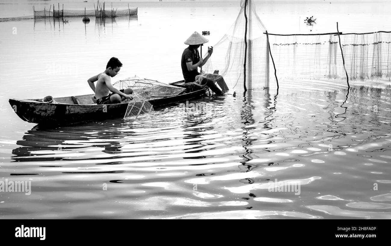 Vietnamese fish farming Black and White Stock Photos & Images - Alamy