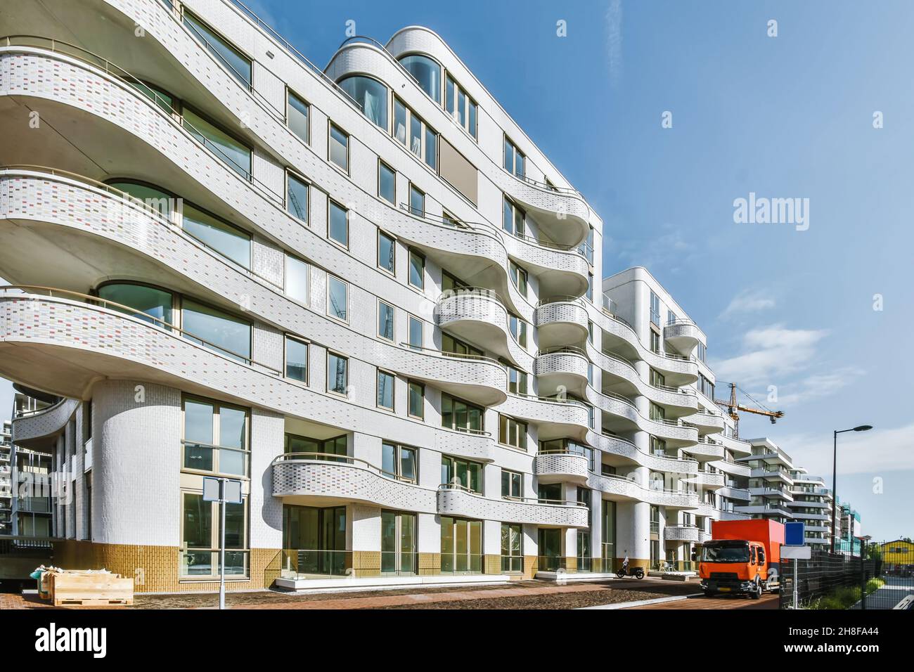 Beautiful multi-storey white building with unusual architecture Stock ...