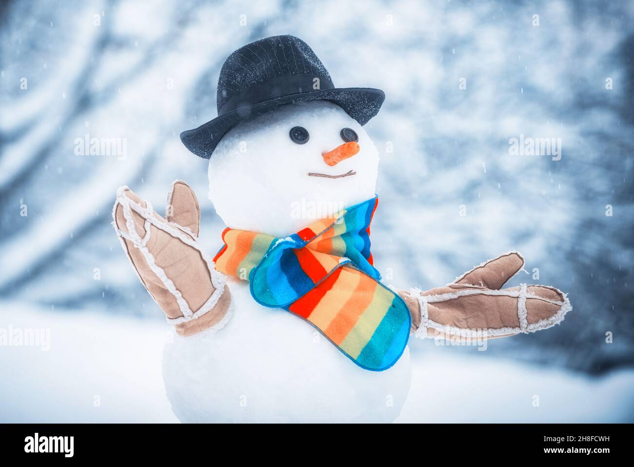 Snow man on sunny winter day. Handmade snowman in the snow outdoor ...