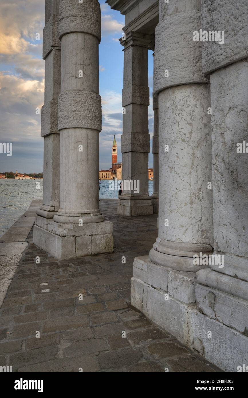 light stone columns at Punta della Dogana in Venice. San Giorgio bell ...