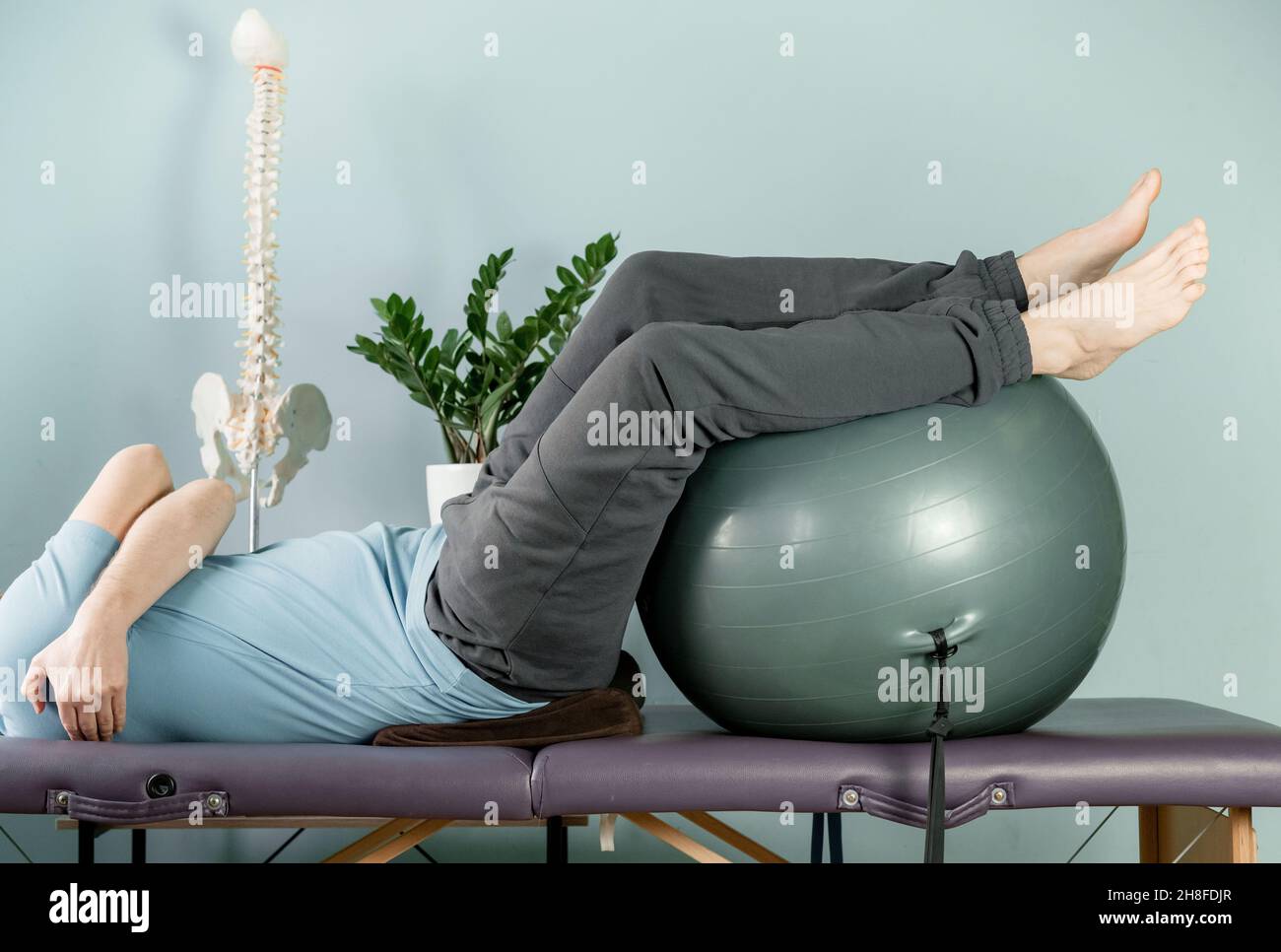 Rotation exercises on the fitness ball in constructive rest position ...