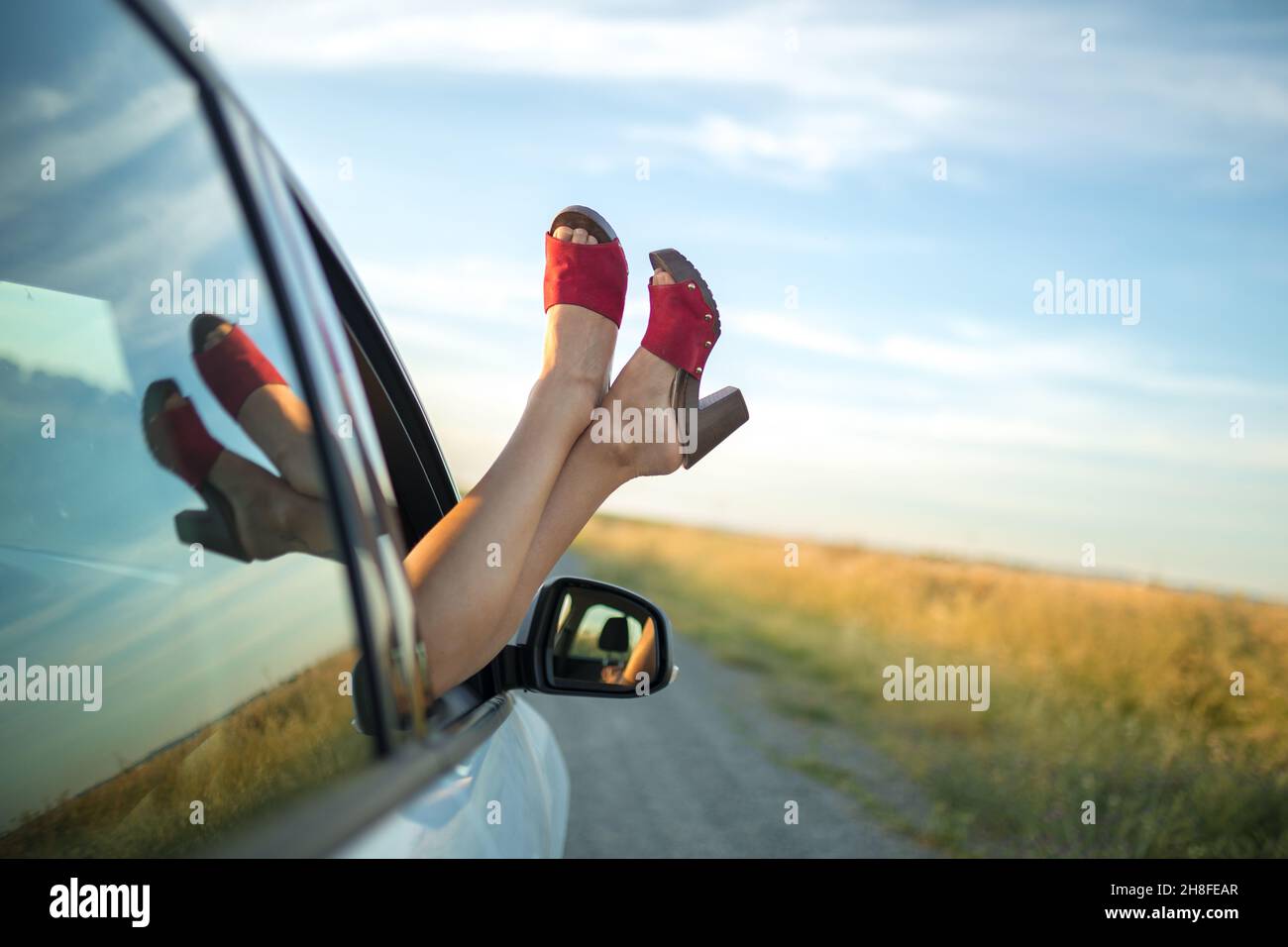 Feet out car window hi-res stock photography and images - Alamy