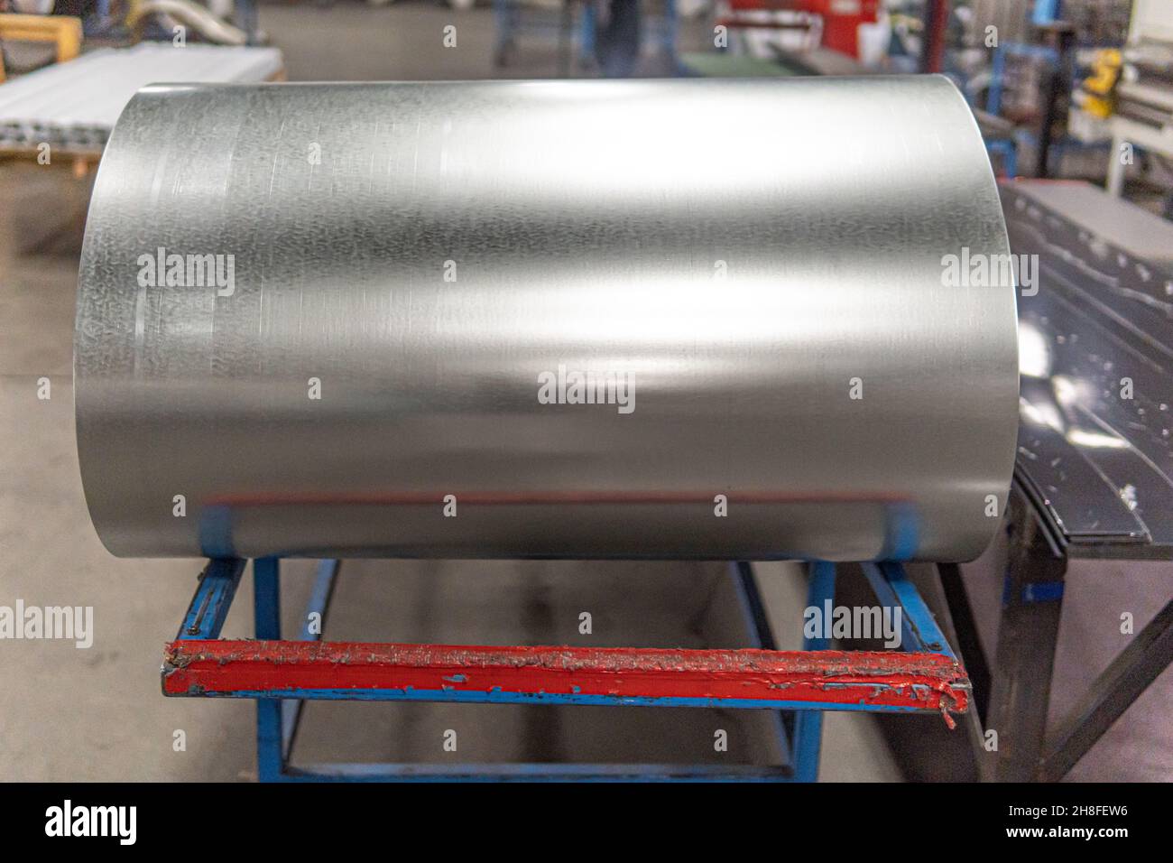 Folded Sheet metal in metal roofing factory Stock Photo - Alamy