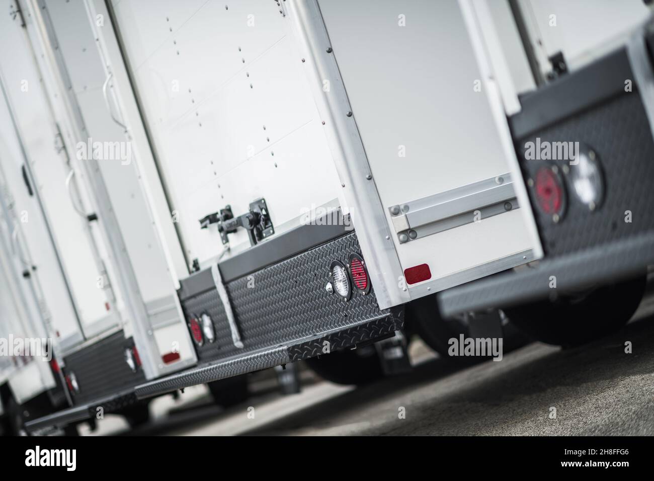 Commercial Cargo Trucks Fleet Close Up. Delivery Vehicles in a Row ...