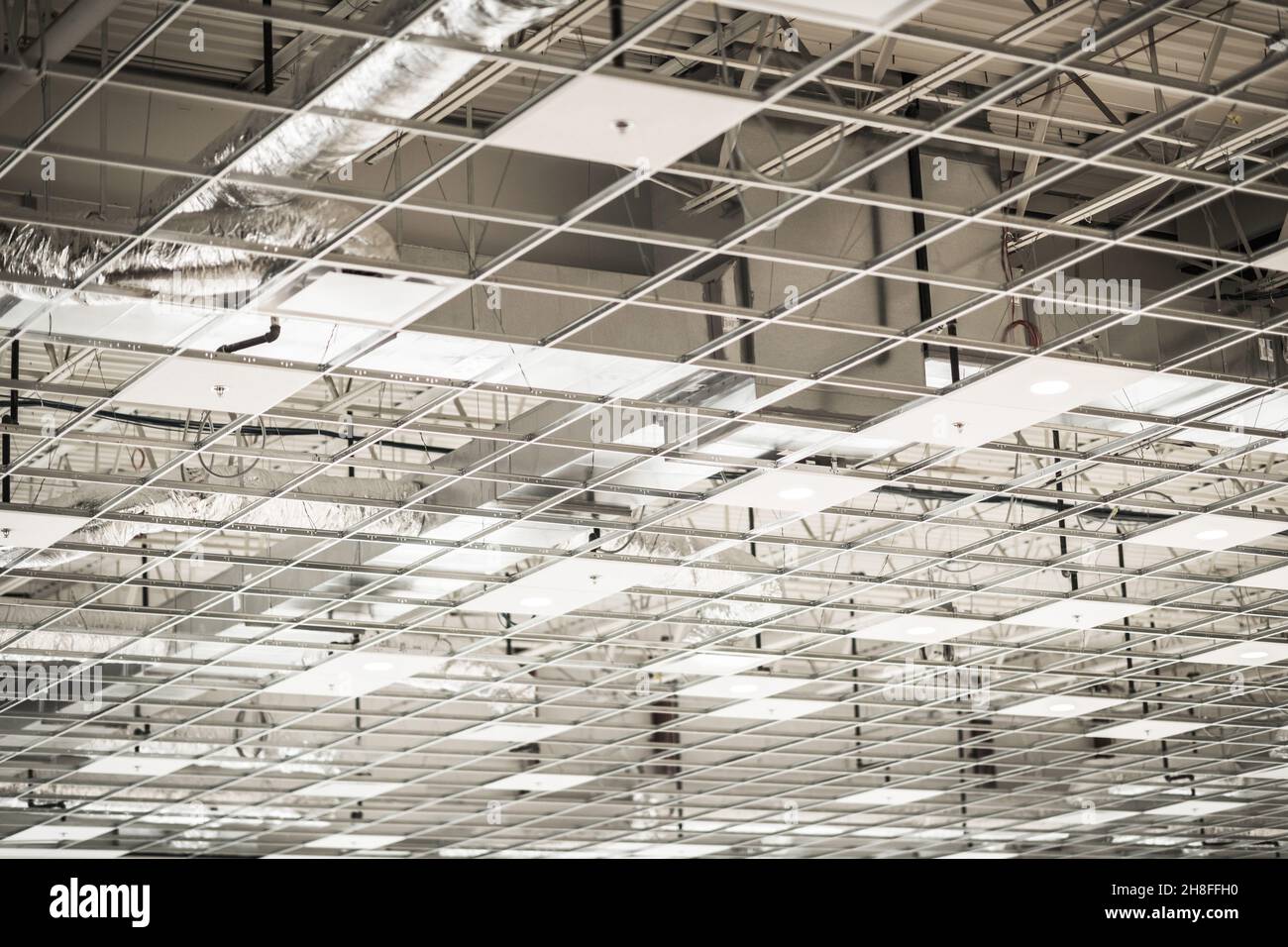 Ceiling Grid and HVAC Installation Inside Commercial Building ...