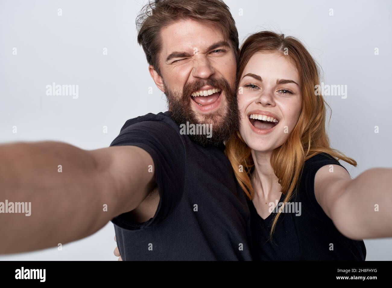 Man and woman hug communication friendship posing light background ...