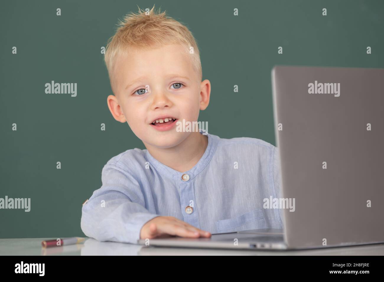 Smart boy student learning online in class. Klever kid study online ...