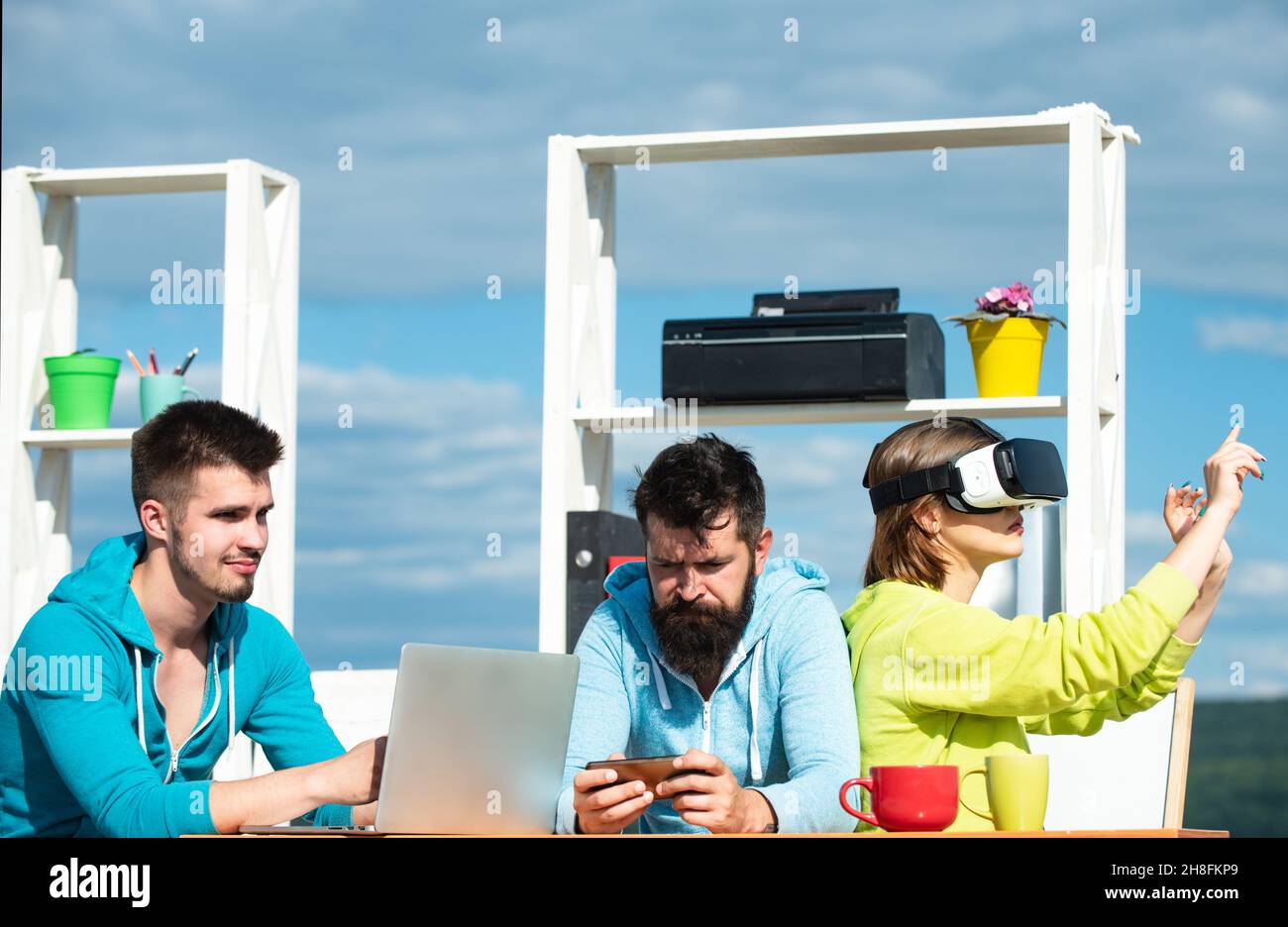 New technology and business concept. Team of three professional male ...