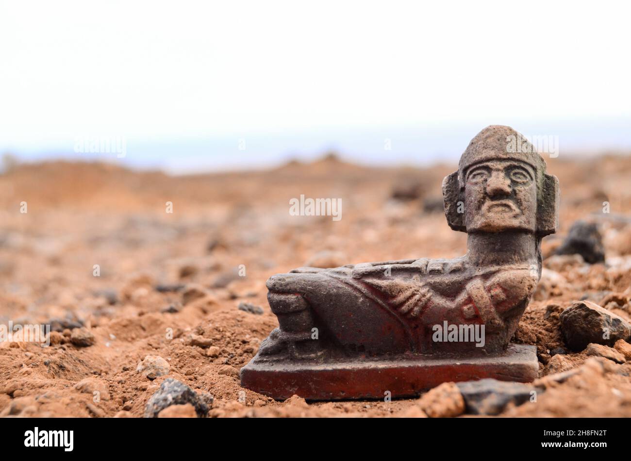 Ancient Maya Statue on the rocks in a desert Stock Photo - Alamy