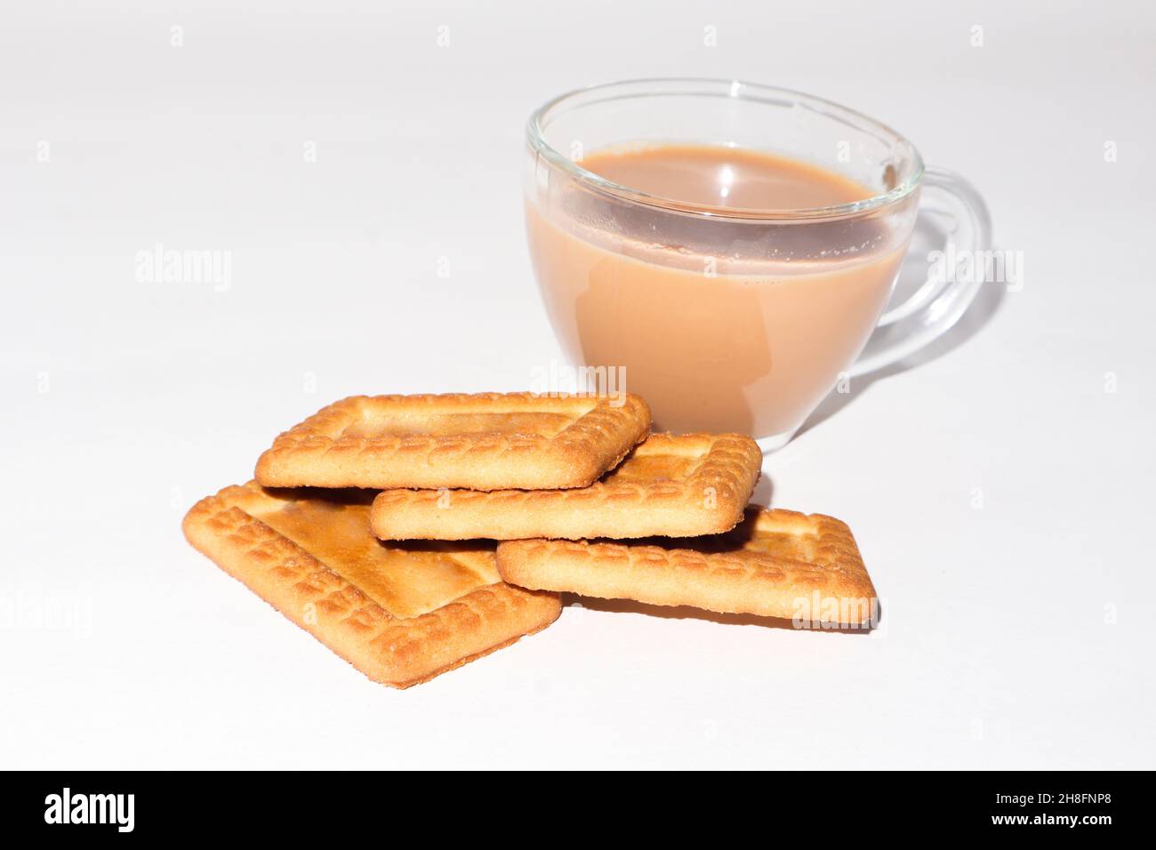 Morning breakfast concept. tea cup and Biscuit on white background ...